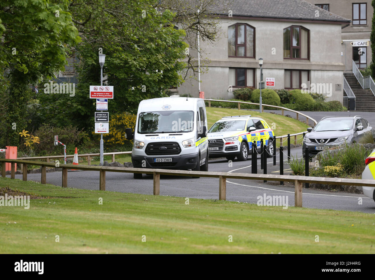 A garda van and an armed support unit vehicle leaving Waterford ...