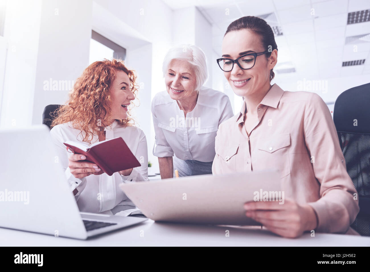 Amazing women working very attentive Stock Photo - Alamy