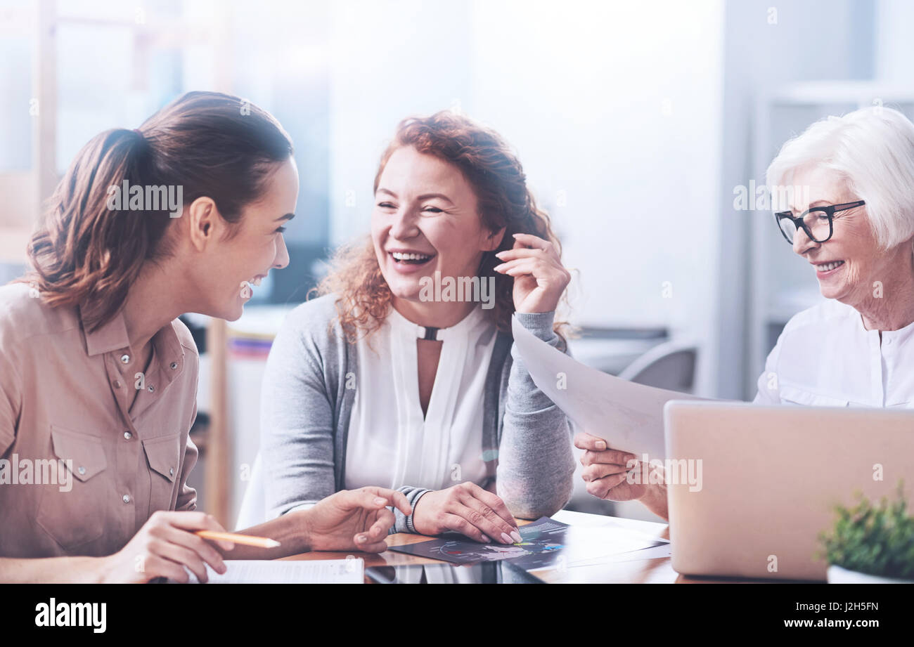 Happy women working in the office Stock Photo - Alamy