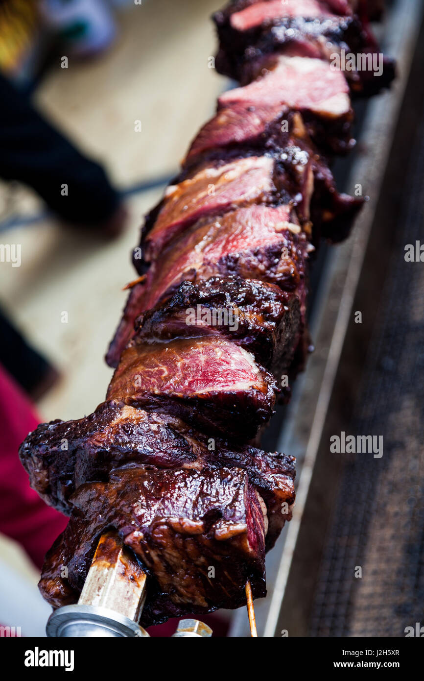 Large pieces of meat on stick. grilled meat Stock Photo - Alamy