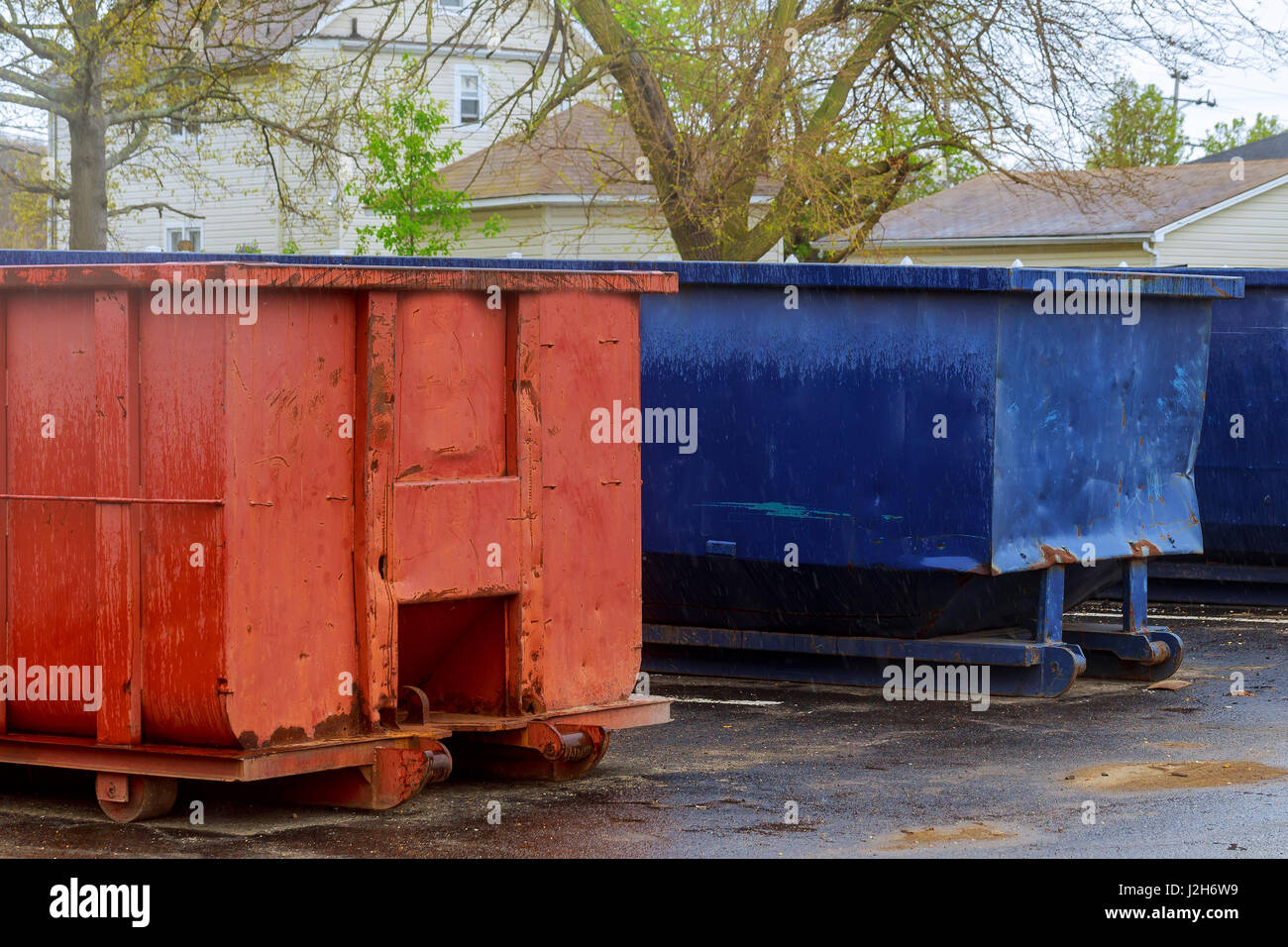 Industrial garbage container on construction site Dumpsters being with ...
