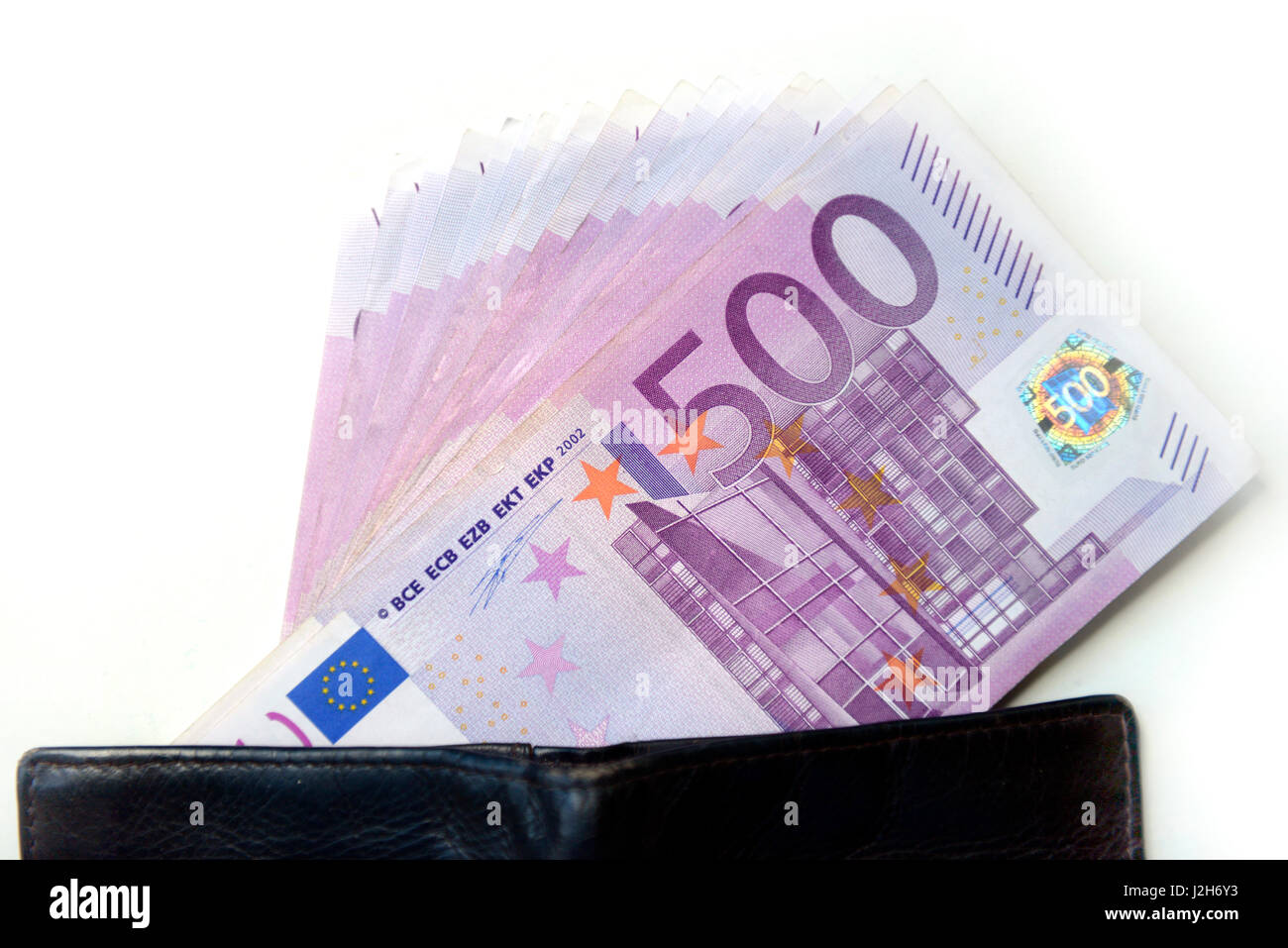 500 euro bills bank notes in hand Stock Photo - Alamy