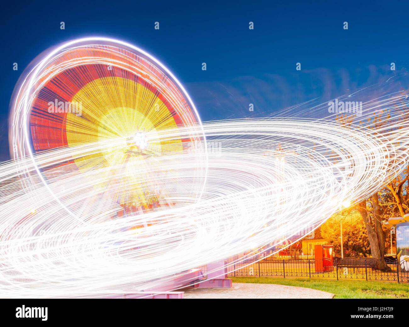 Rotating In Natural Motion Effect Illuminated Attraction Ferris Wheel ...