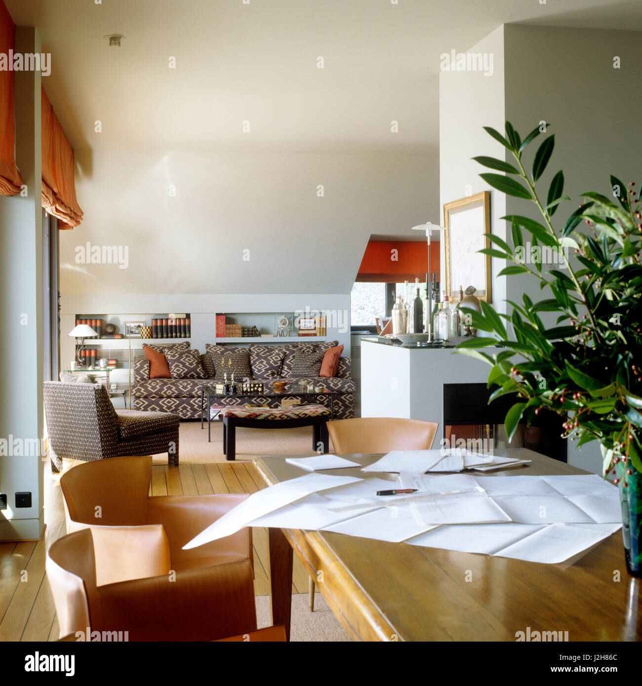 Modern open plan dining and living room Stock Photo - Alamy