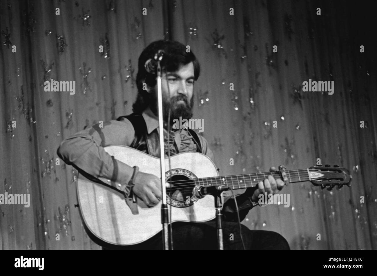 French guitar player Marcel Dadi performing at Bobino in 1967. Photo ...