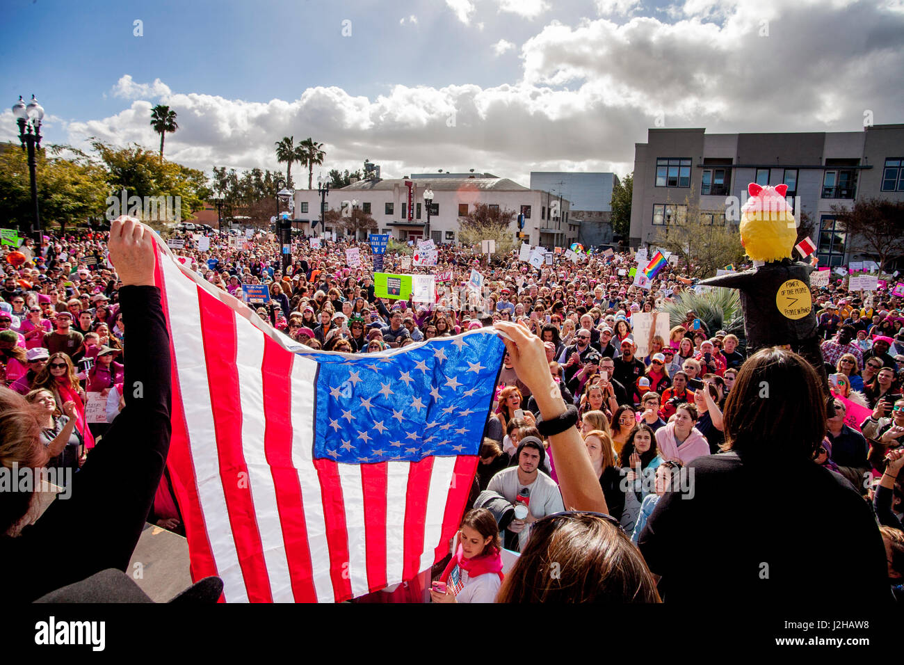 Walking marching crowd flag building exterior hi-res stock photography ...