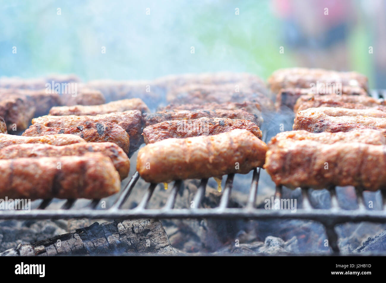 Traditional Romanian food, grilled meat rolls known as mititei Stock ...