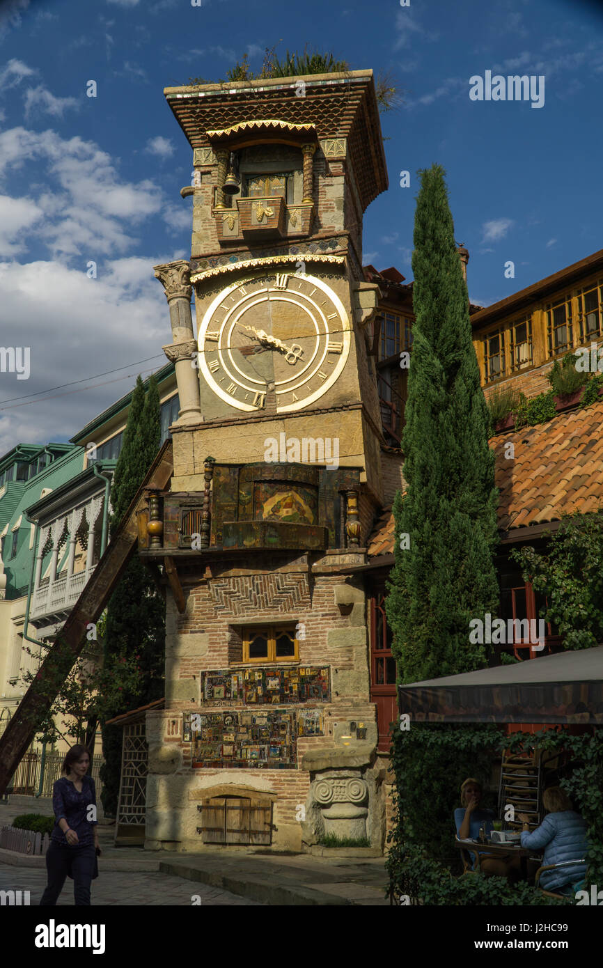 The leaning clock tower of Rezo Gabriadze Marionette Theatre. Sunny day ...