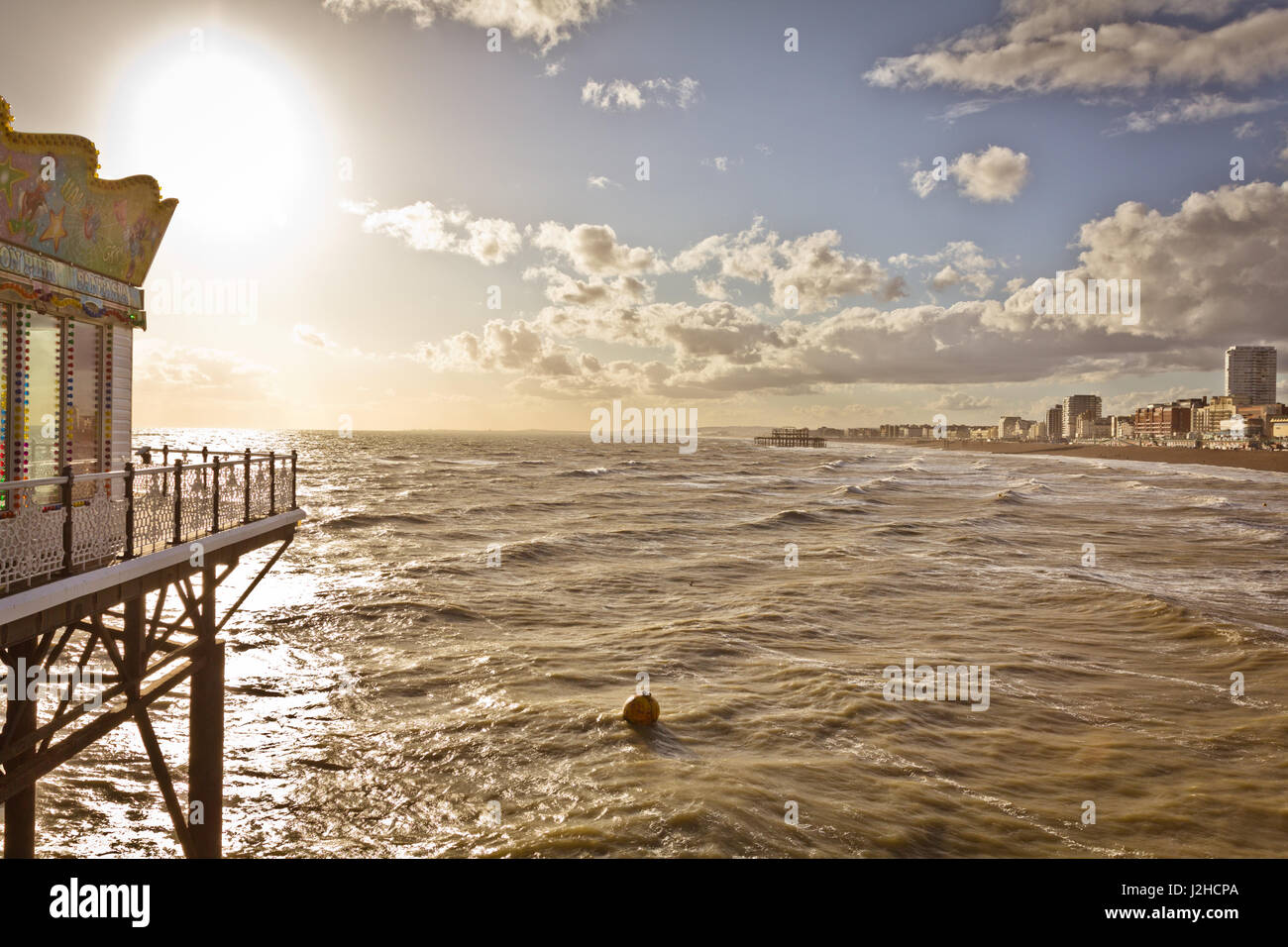 Beautiful sunlight during a sundown on the Brighton pier Stock Photo ...