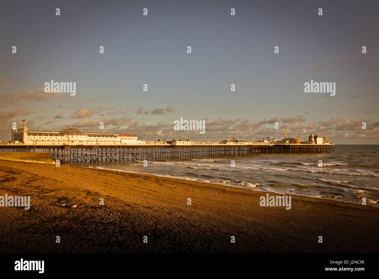 Beautiful sunlight during a sundown on the Brighton pier Stock Photo ...