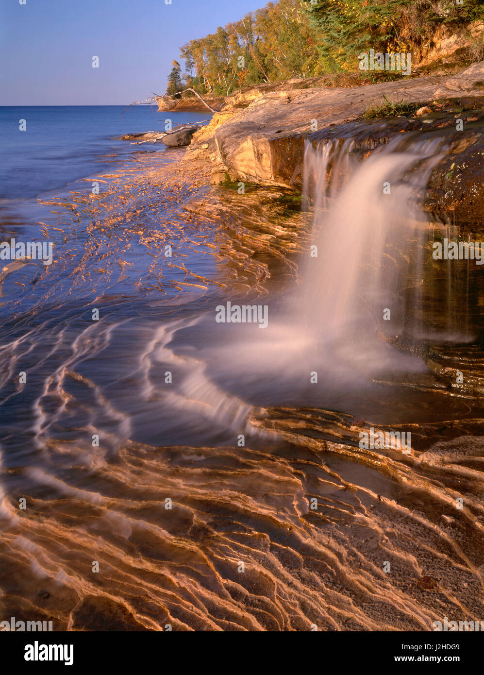 USA, Michigan, Pictured Rocks National Lakeshore, Small waterfall ...