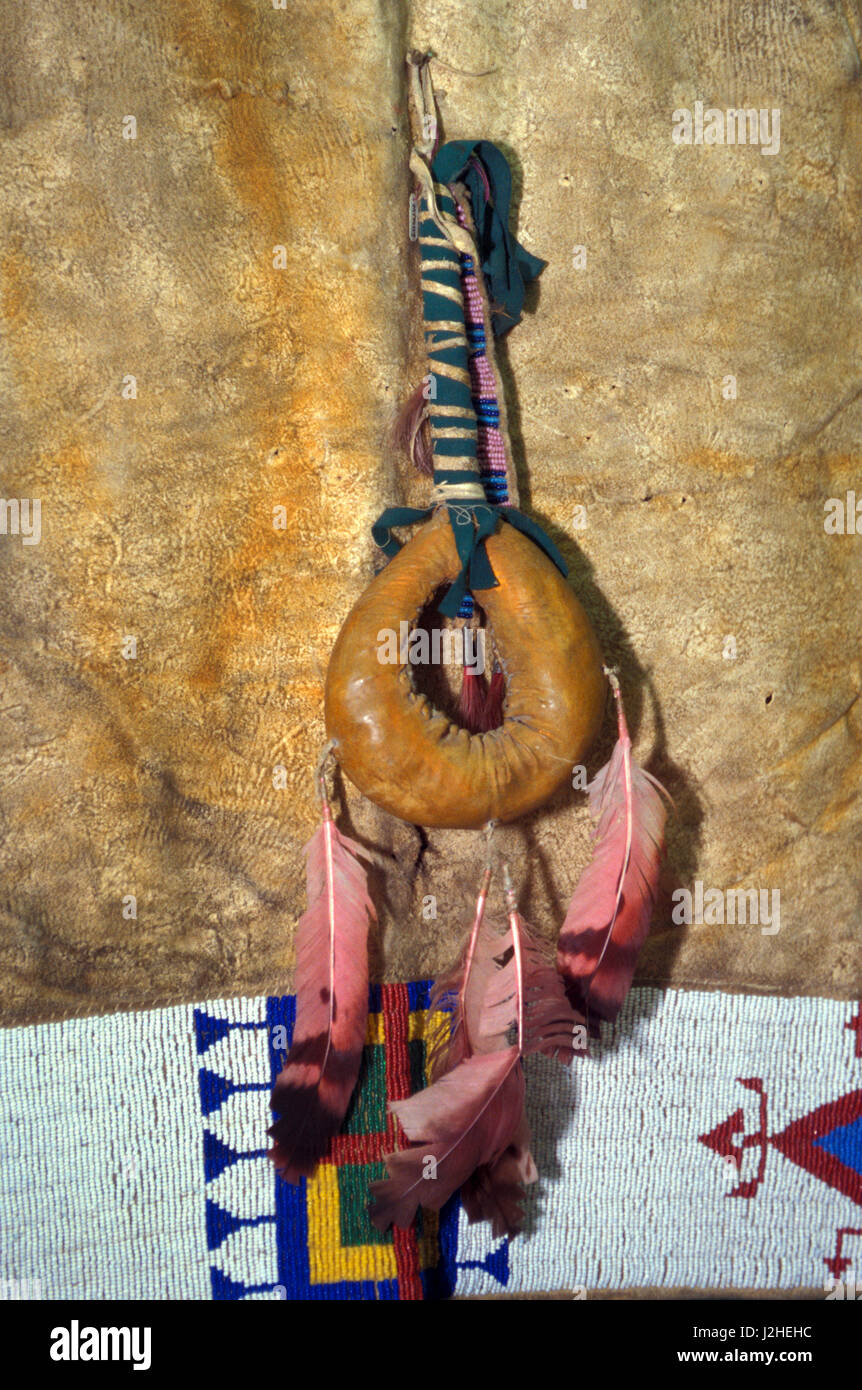 Blackfeet medicine rattle hangs from a leather thong meant to be worn ...