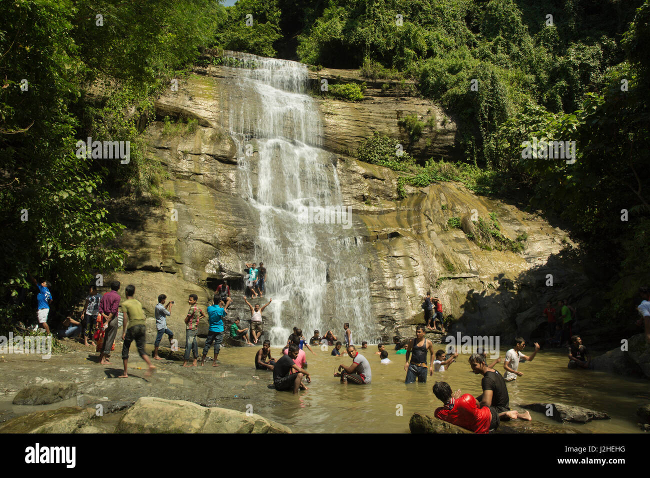 Tourists flock at the Khoiyachora multisteps waterfalls at Mirsharai ...