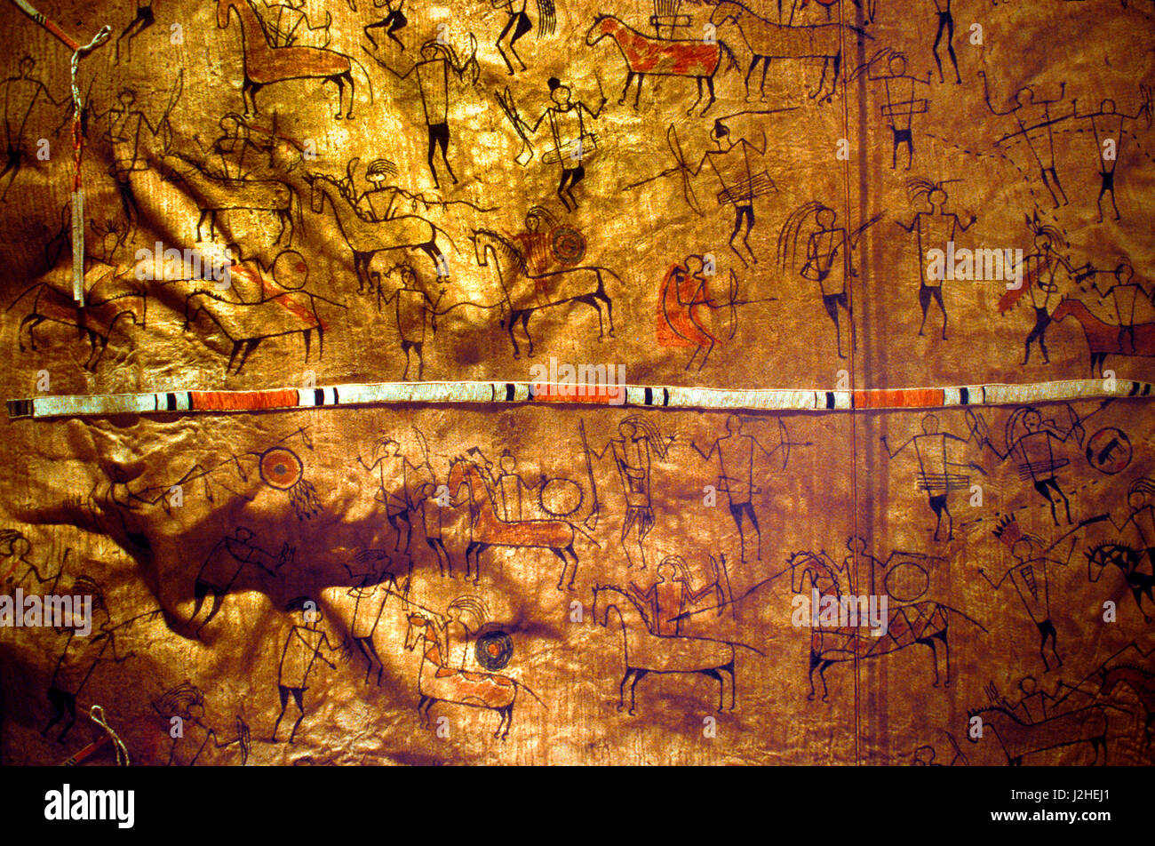 Blackfeet painted buffalo hide decorated with a quilled stripe down the ...