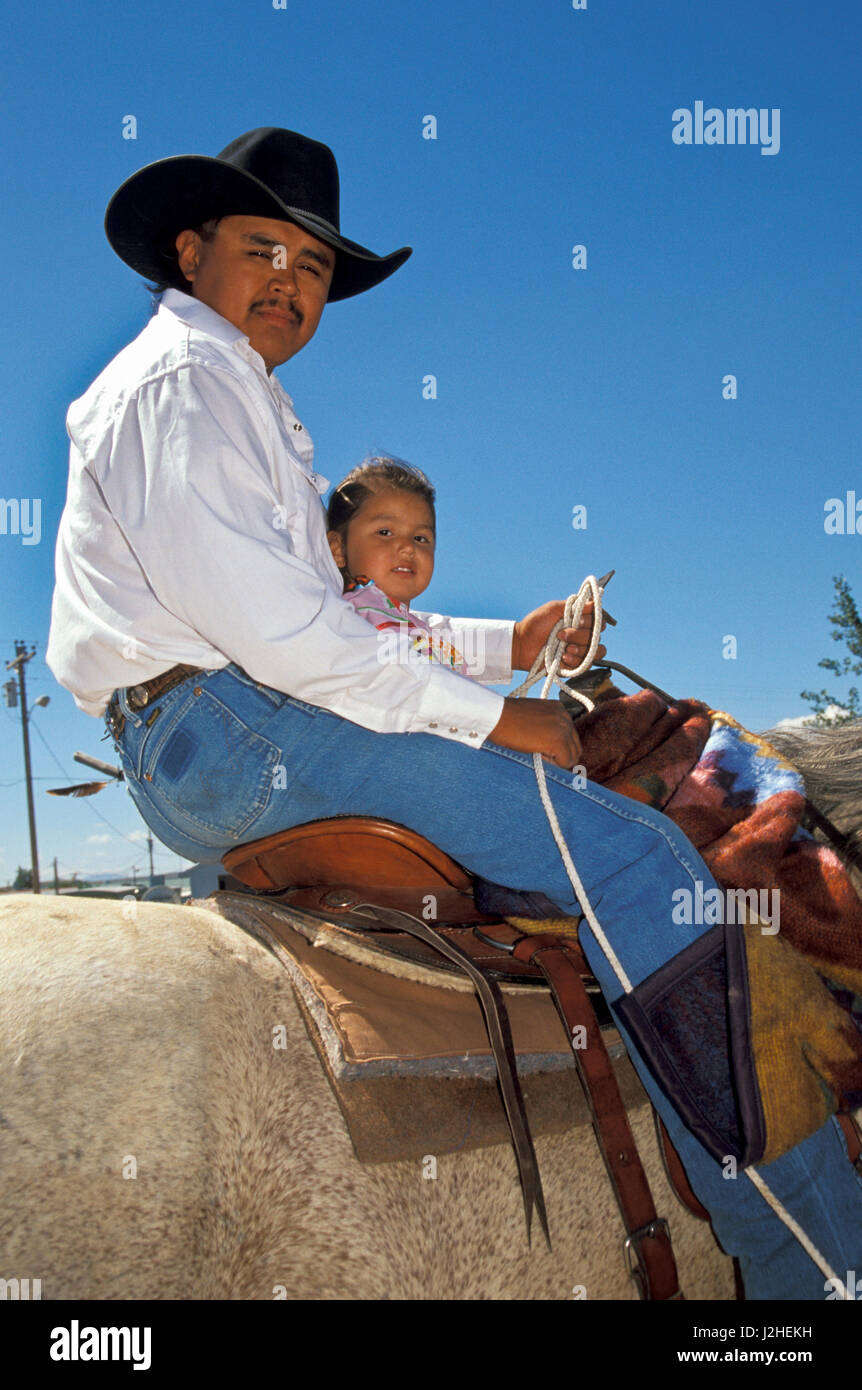 Native American father and daughter sit on horseback, Blackfeet Indian ...
