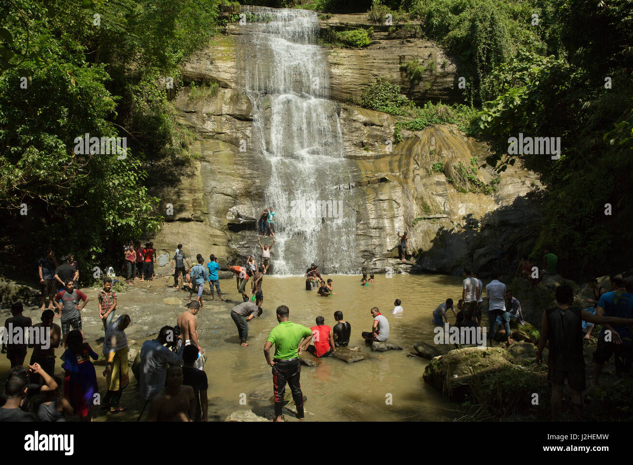 Tourists flock at the Khoiyachora multisteps waterfalls at Mirsharai ...