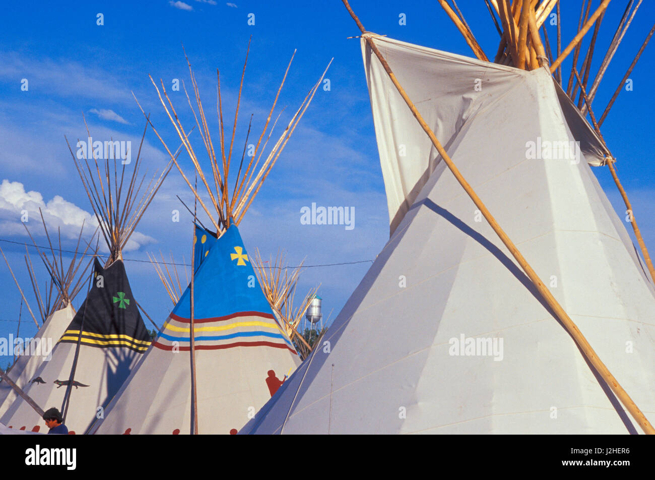 Colorfully painted with decorative designs on Blackfeet tepees made ...