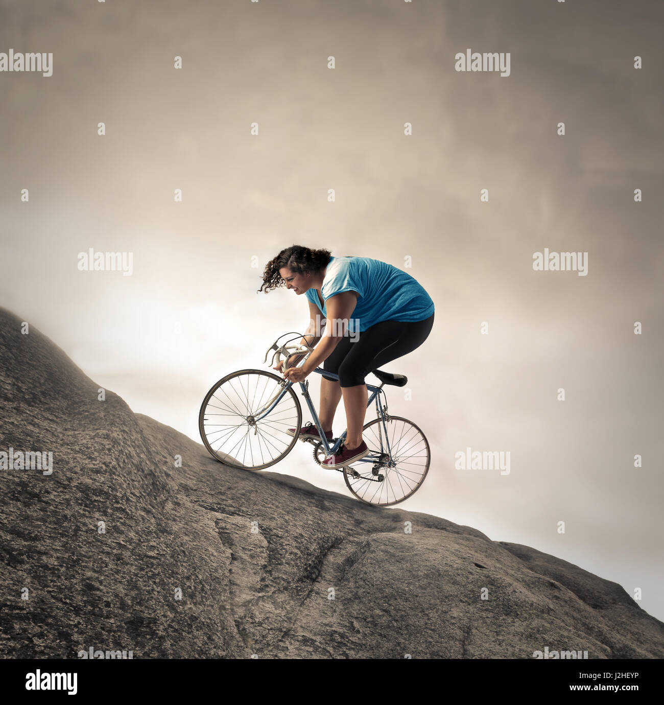 Bike woman rain hi-res stock photography and images - Alamy
