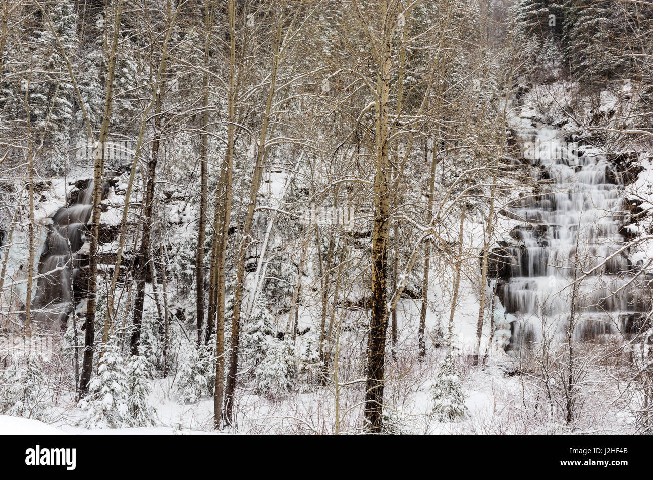 The Silver Stairs waterfall in winter in the Flathead National Forest ...