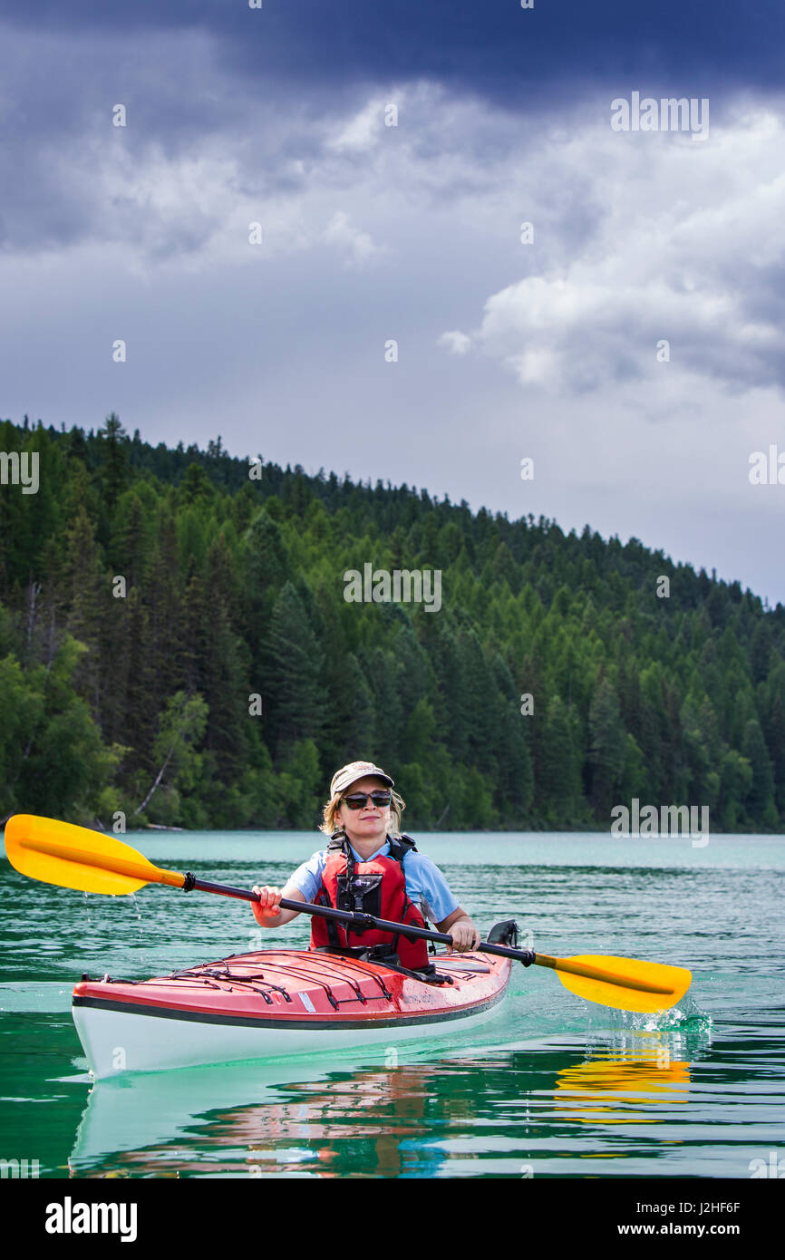 Kayaking on Beaver Lake near Whitefish, Montana, USA (MR Stock Photo ...