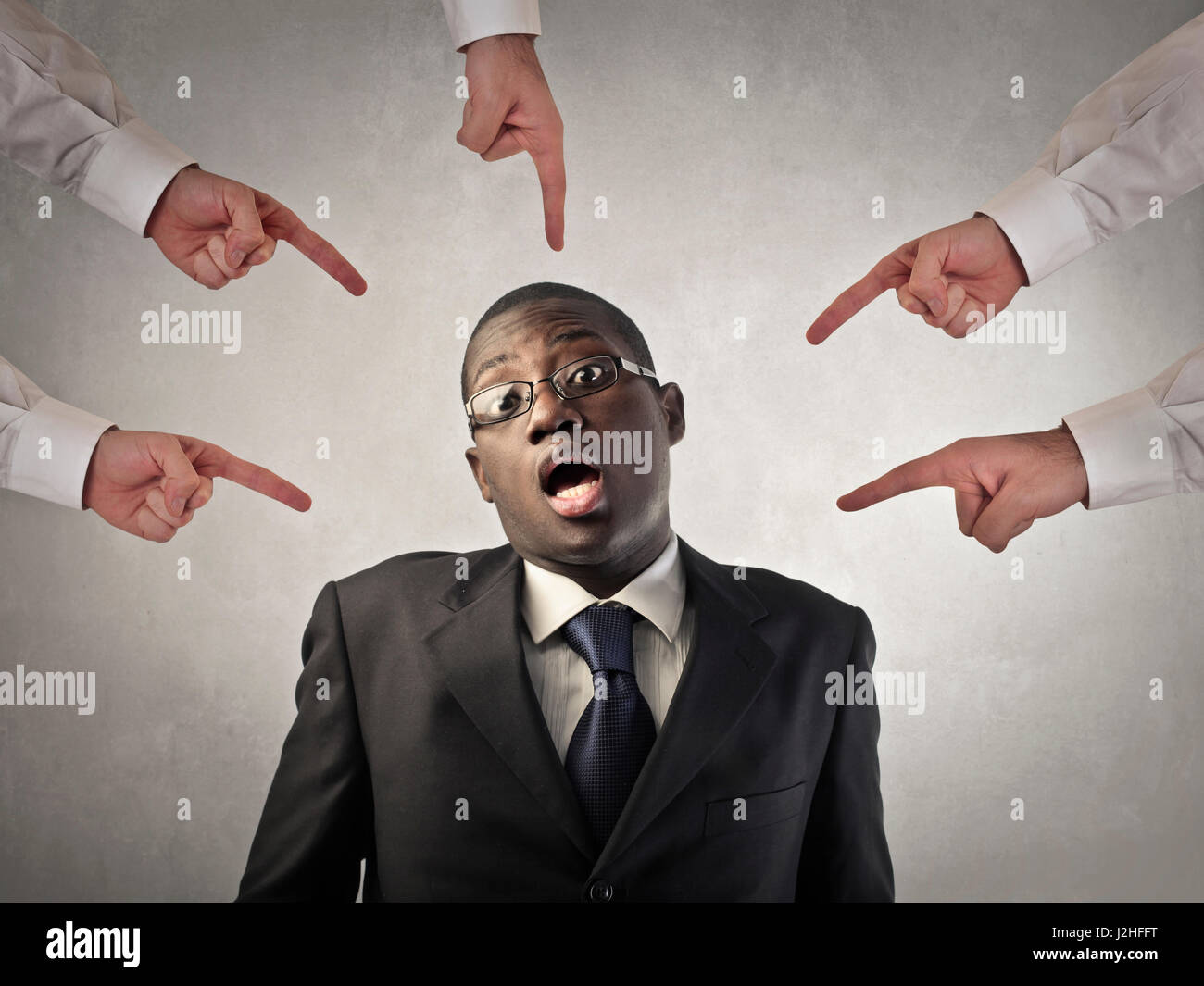 5 hand pointing at businessman Stock Photo - Alamy