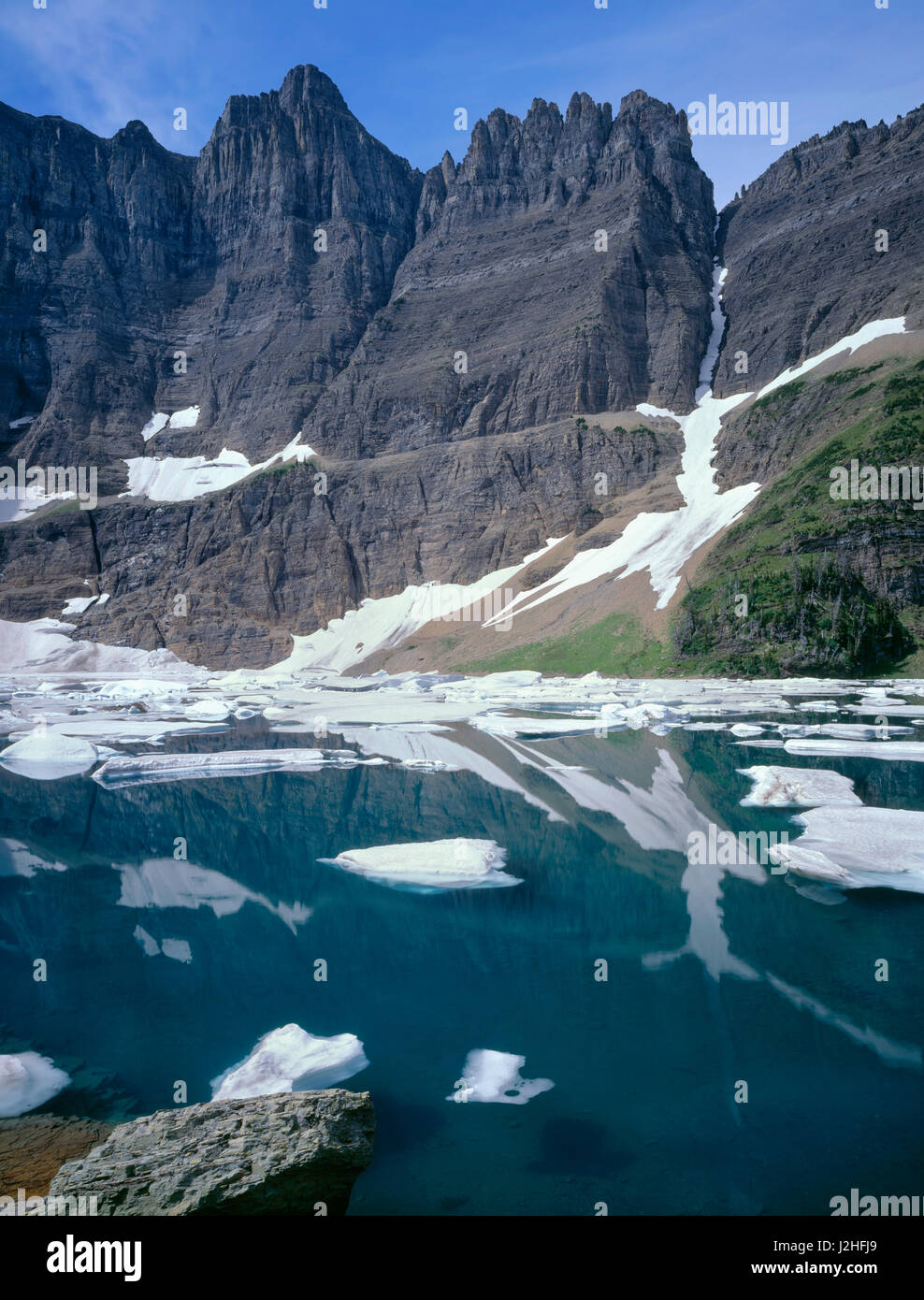 USA, Montana, Glacier National Park, Steep cliffs of the Ptarmigan Wall ...