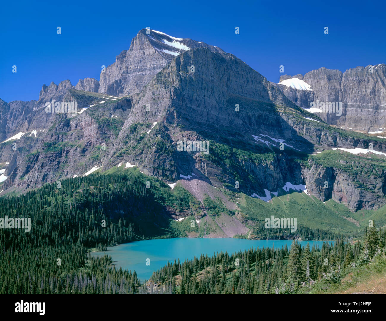 USA, Montana, Glacier National Park, Mount Gould and Angel Wing (center ...