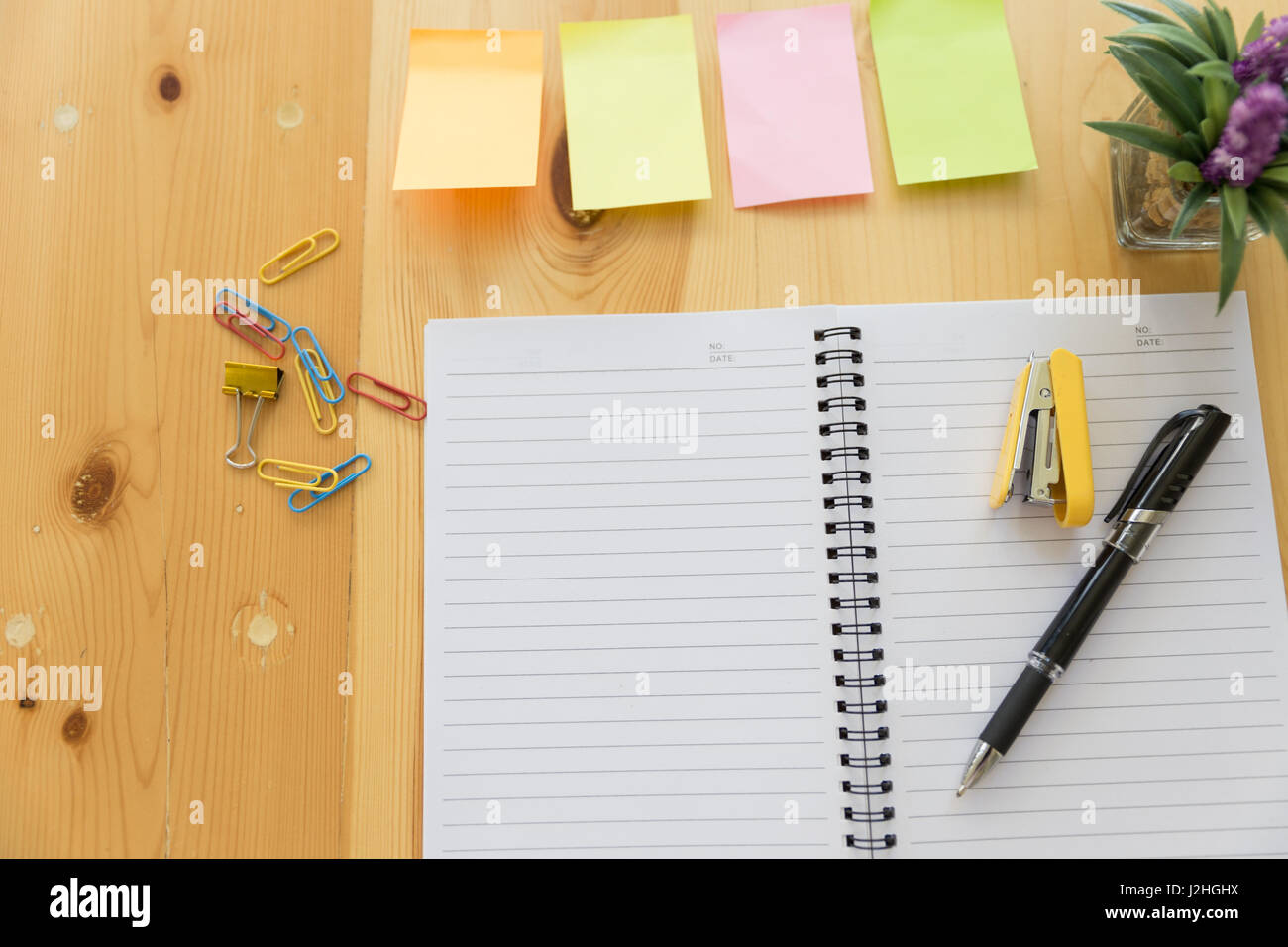 wood office table with notebook, pen, sticky note. top view Stock Photo ...
