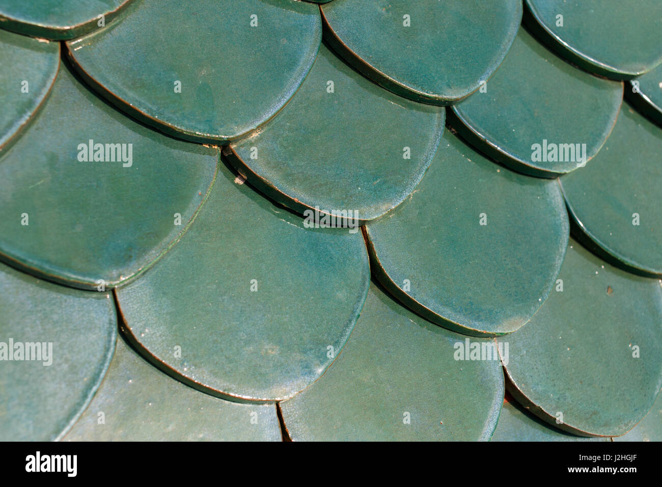 Texture of green semi-circular tile for roof Stock Photo - Alamy