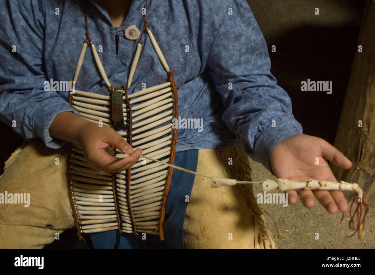Ring and pin game made from bones, string and needle was a game played ...