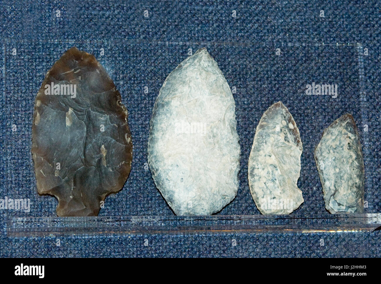 Stone projectile points used on the tips of arrows on display at the On ...