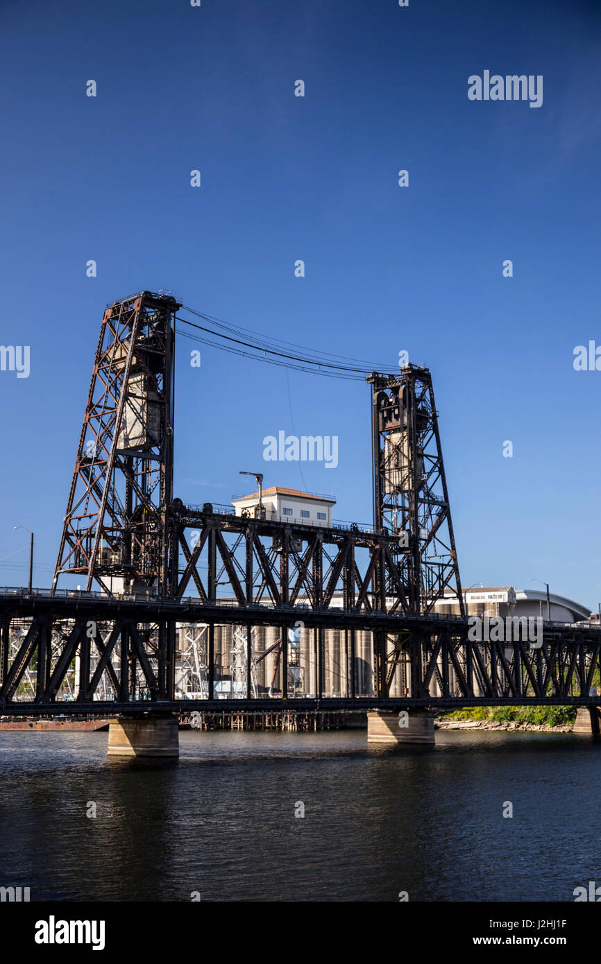 USA, Oregon, Portland. Steel Bridge spans the Willamette River and was ...