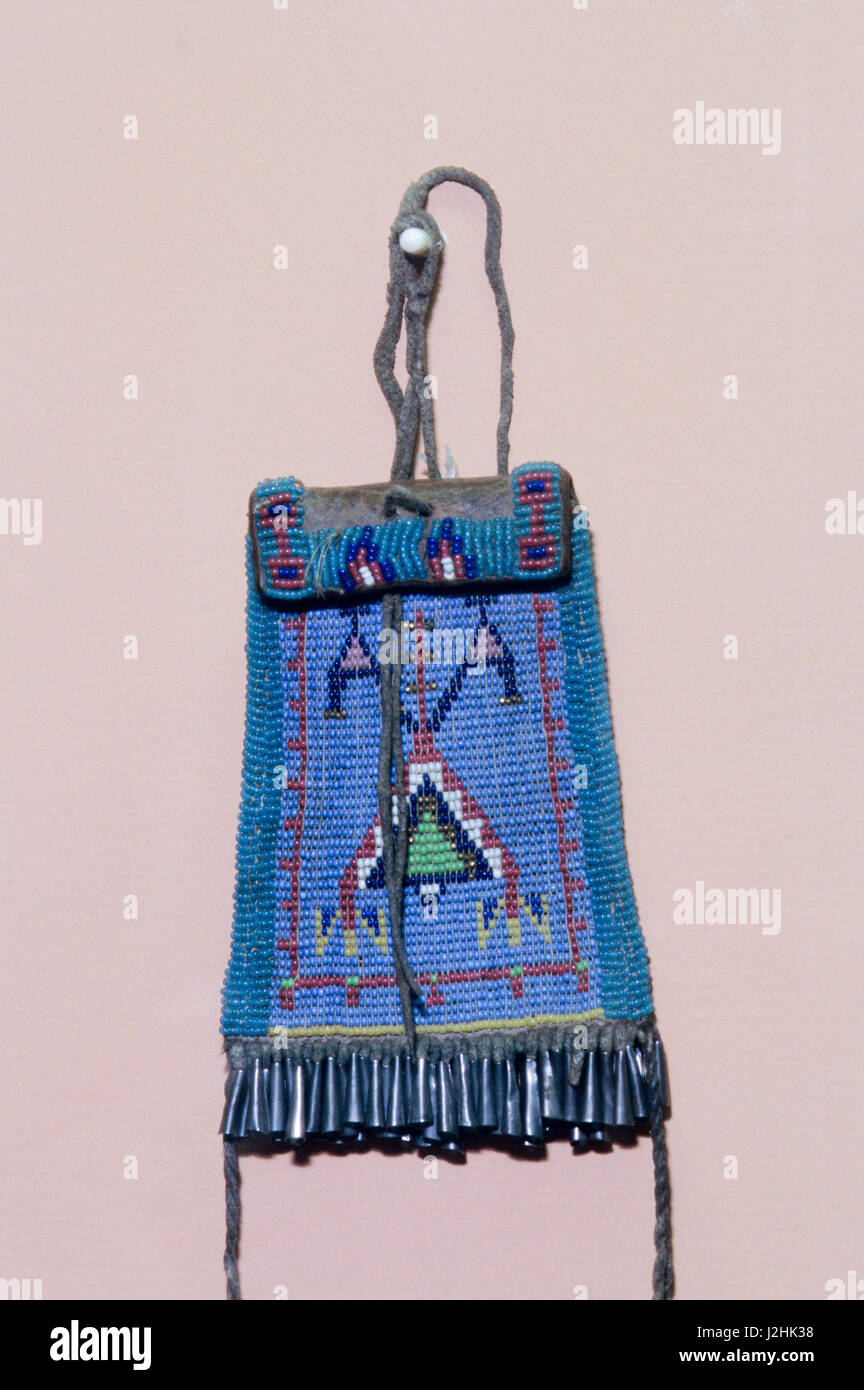 Ute beadwork on a small bag also decorated with tin jingle cones Stock ...