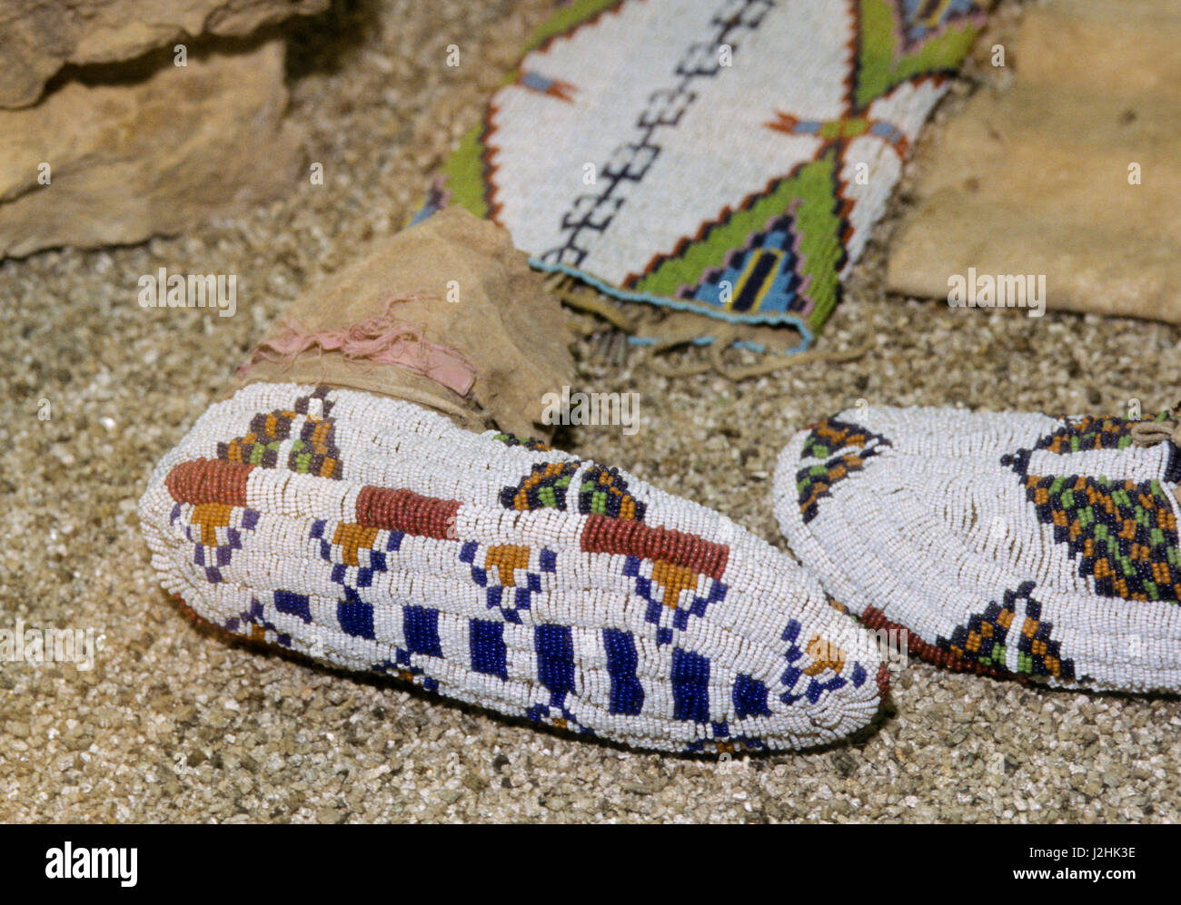 Ute geometric beadwork decorating a pair of ceremonial moccasins on ...