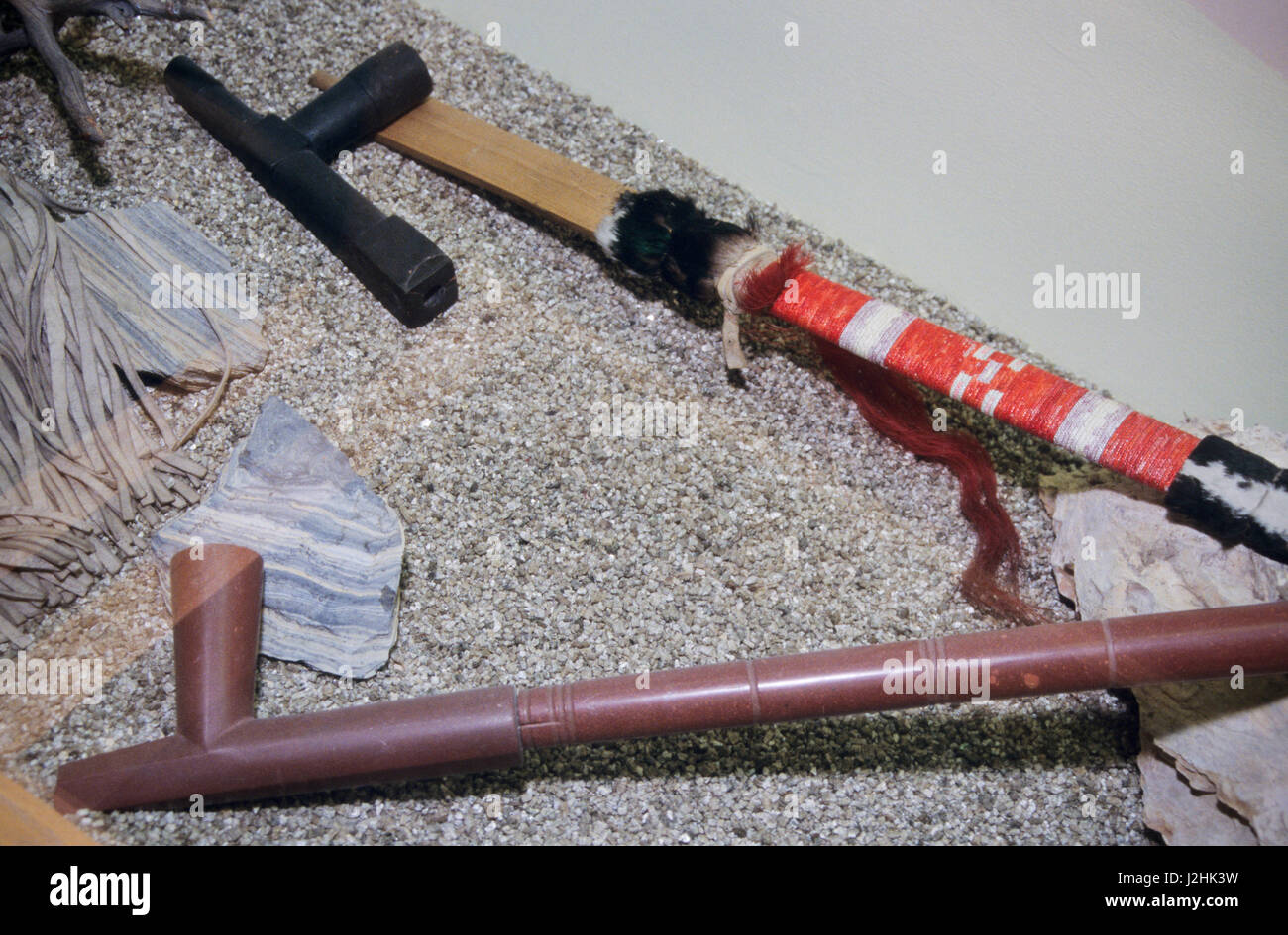 Ceremonial pipes made from red pipestone and wood decorated with ...