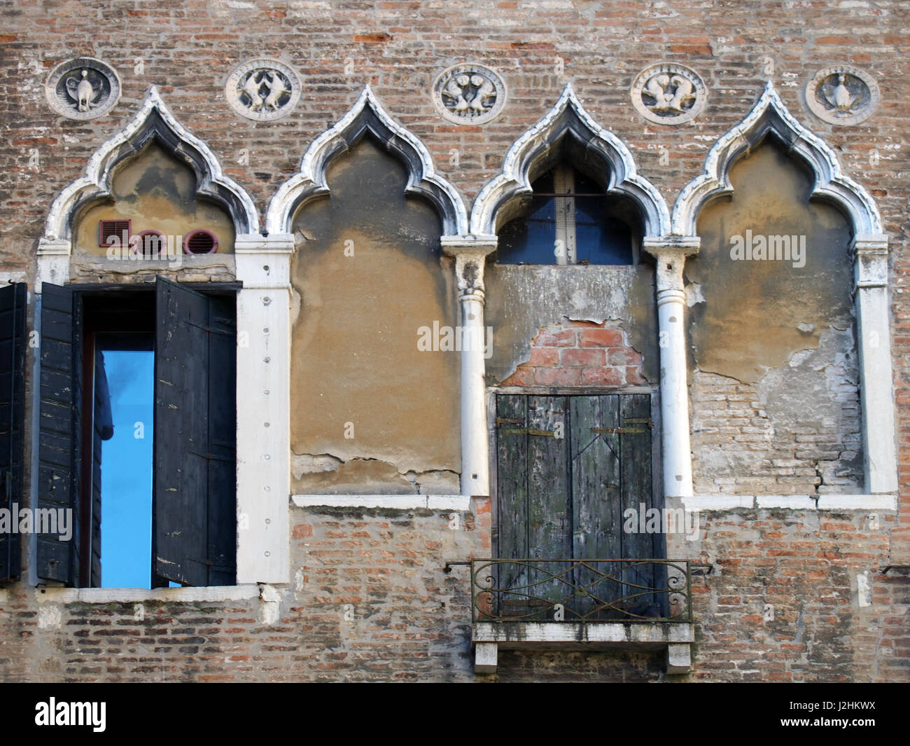 venice old building with ornate shuttered windows Stock Photo - Alamy