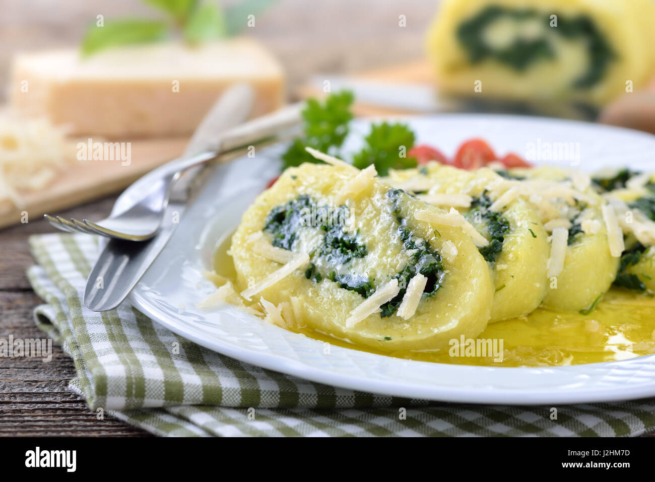 Delicious South Tyrolean potato spinach roulade with shaved parmesan ...