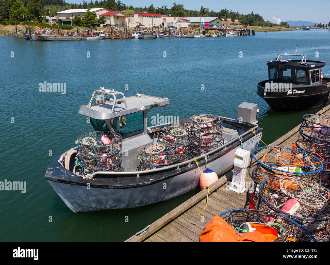WA, La Conner, Swinomish Channel, fishing boats with crab pots Stock ...