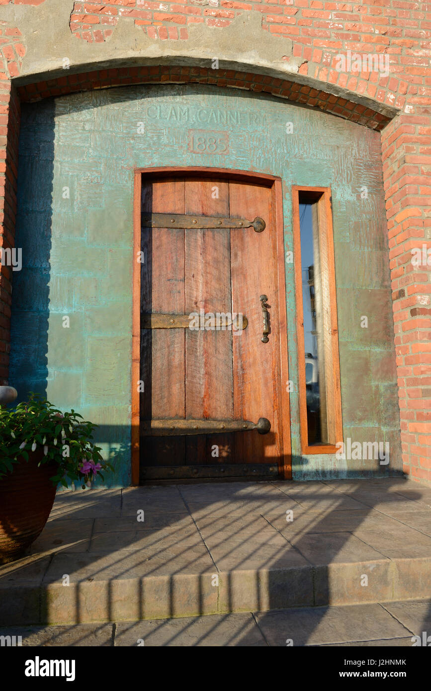 Washington State, Port Townsend. Wooden door at the former Clam Cannery ...