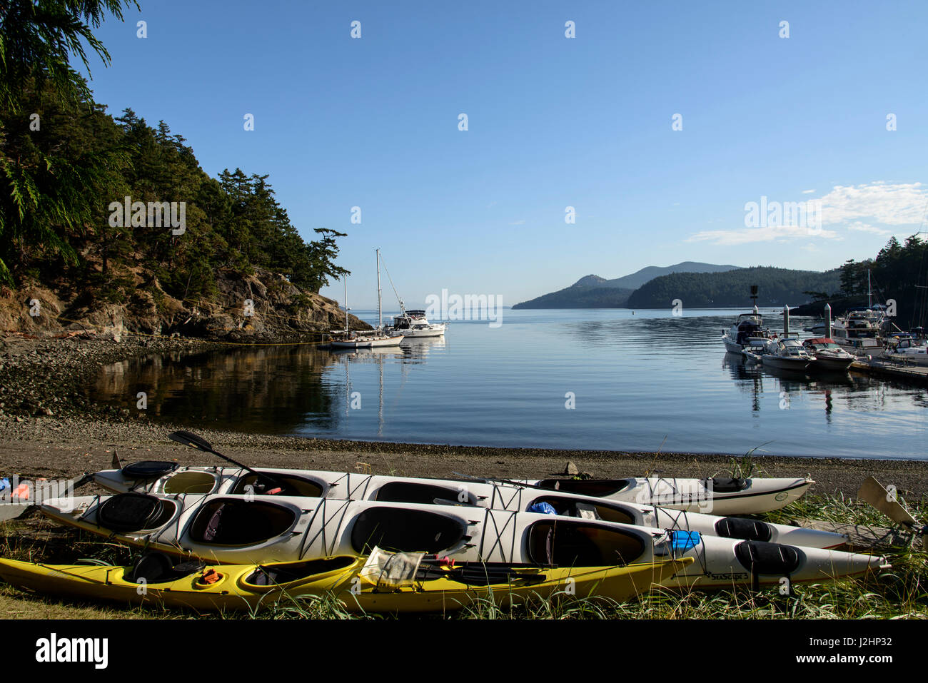 San Juan Islands, WA. Kayaks on beach at Jones Island State Park ...