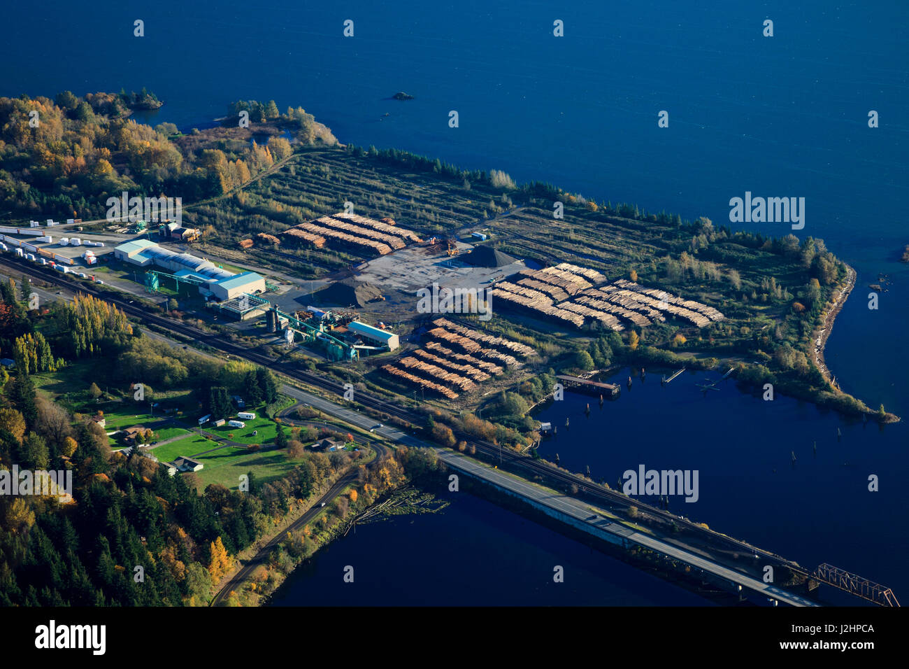 USA, Washington State, aerial landscape of sawmill along the Columbia ...