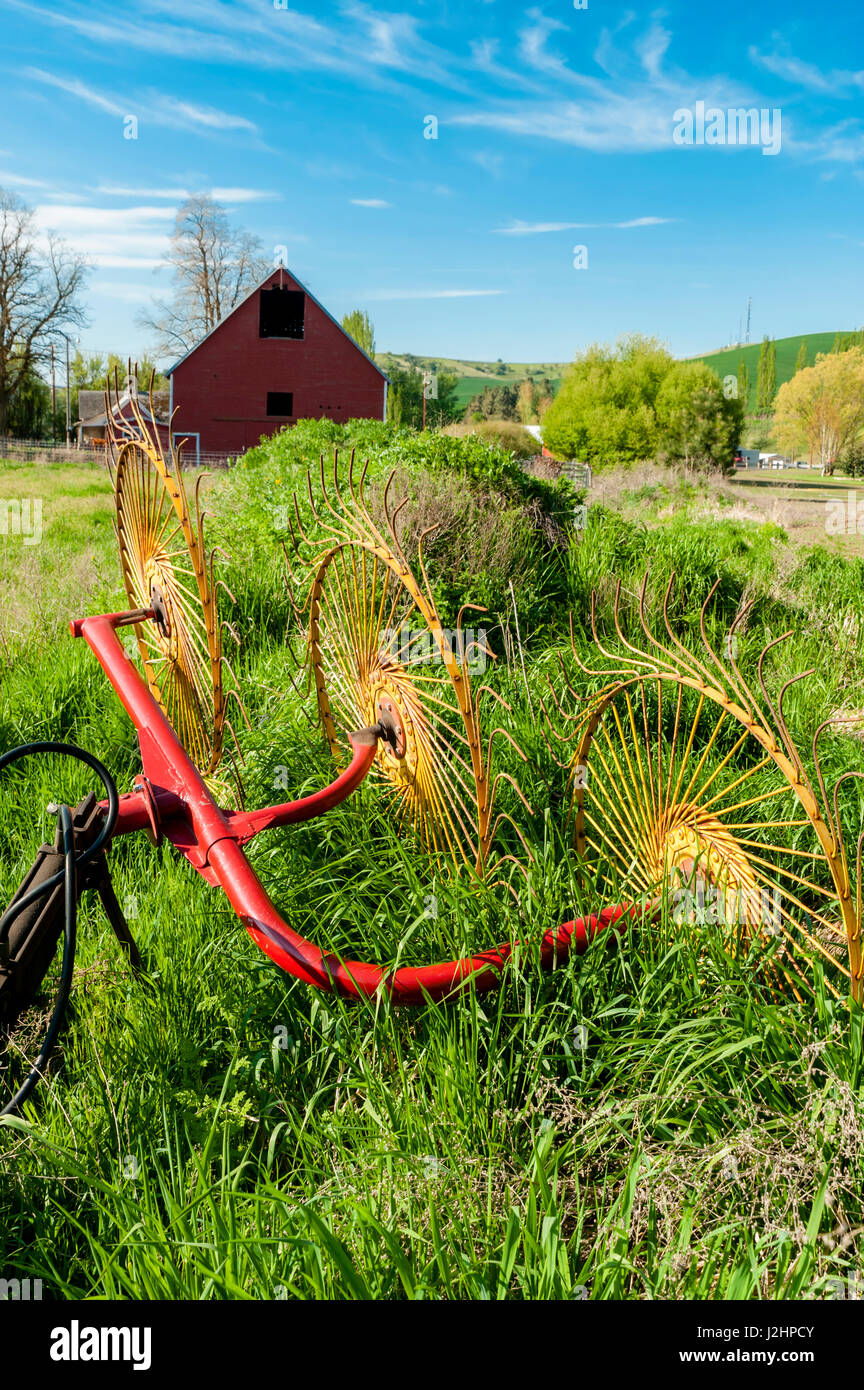 USA, Washington, Dayton. Barn and hay rake outside Dayton, near Walla ...