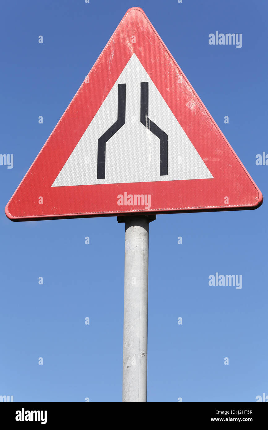 Dutch road sign: road narrows on both sides Stock Photo - Alamy
