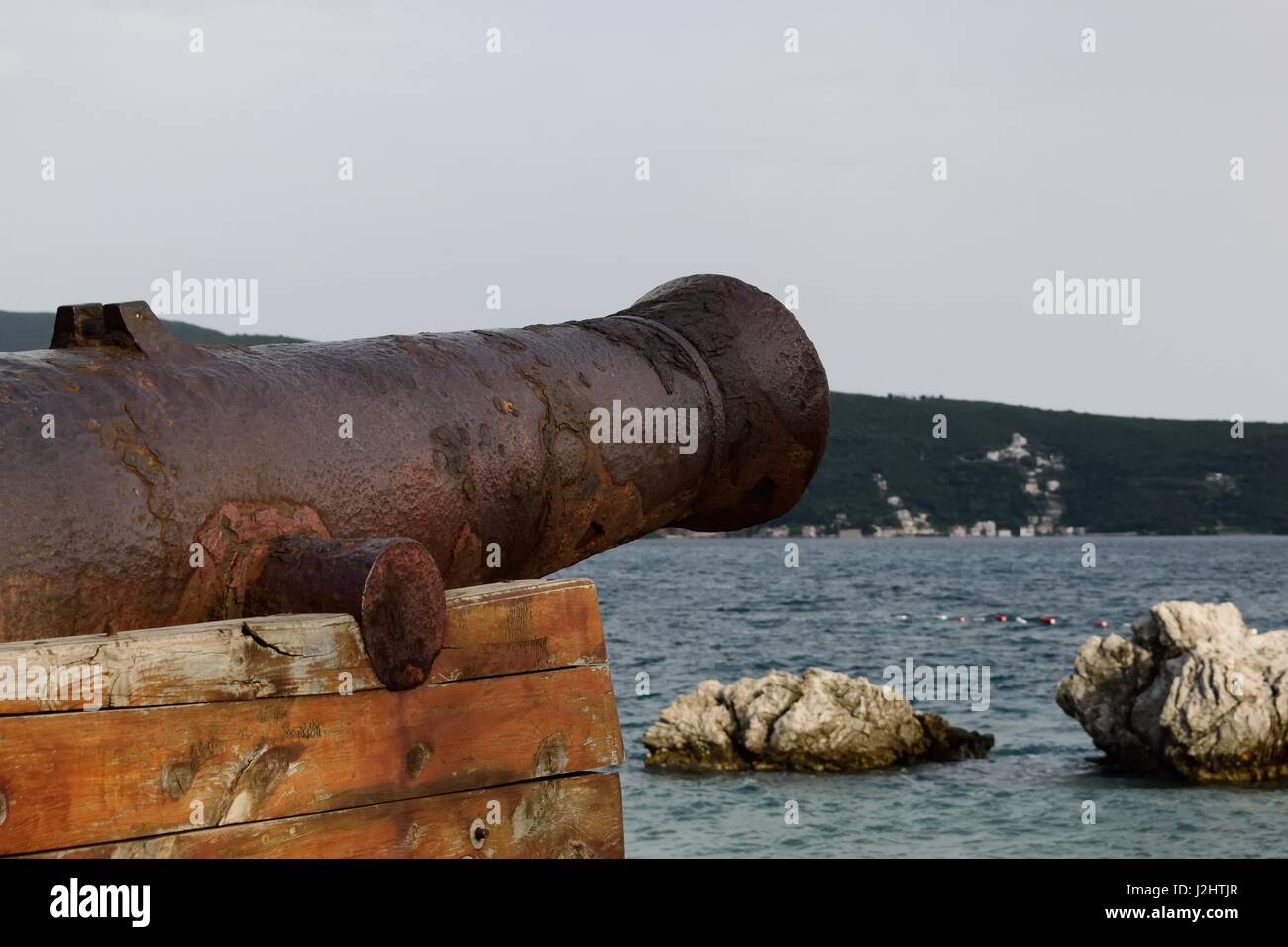 Rusty cannon on beach in herceg novi Stock Photo - Alamy