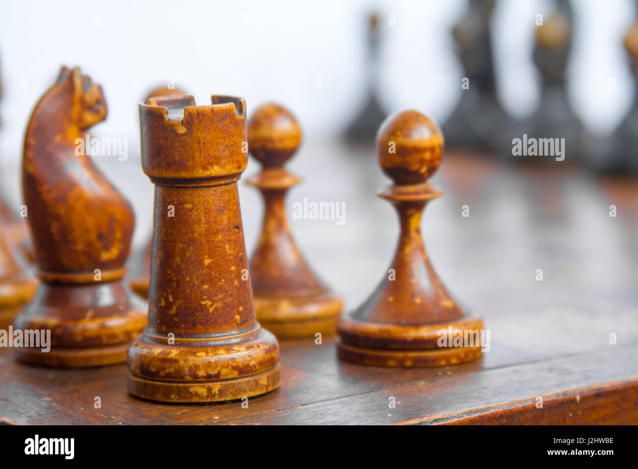 Old chess Board with wooden pieces on a white background Stock Photo ...