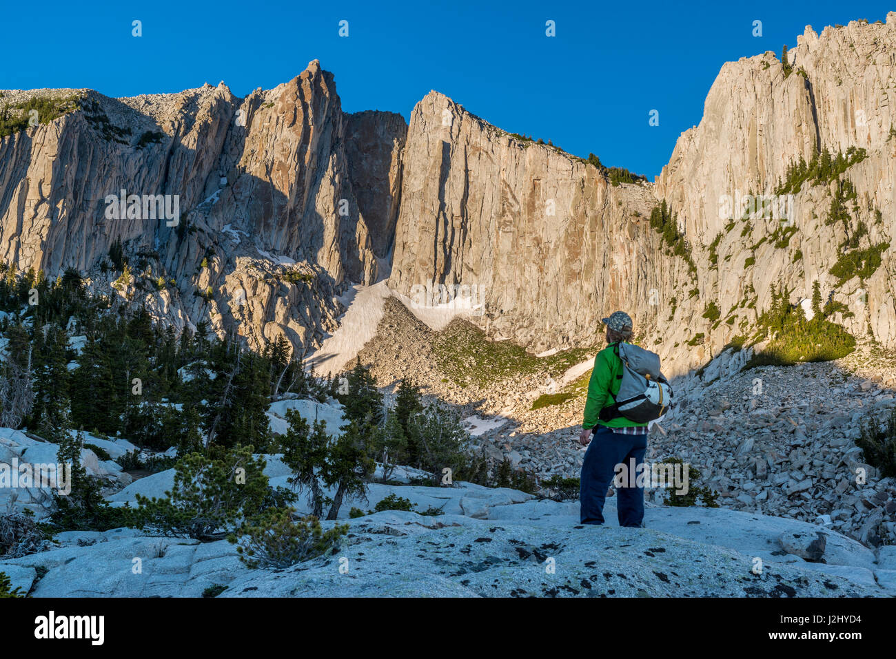 Alex schmidt admires lone peak cirque hi-res stock photography and ...