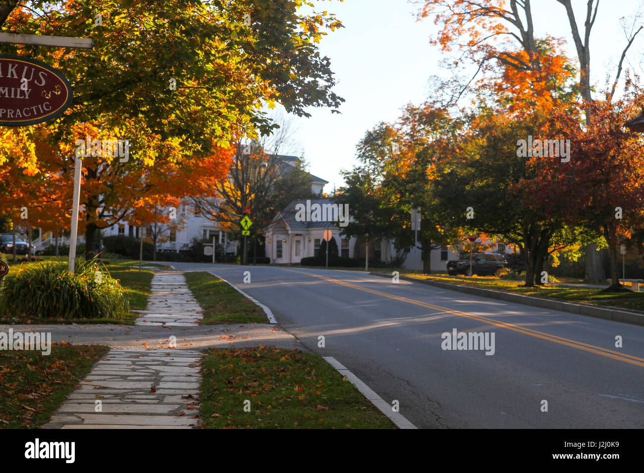 A marble sidewalk under fall foliage in Manchester, Vermont, USA Stock ...