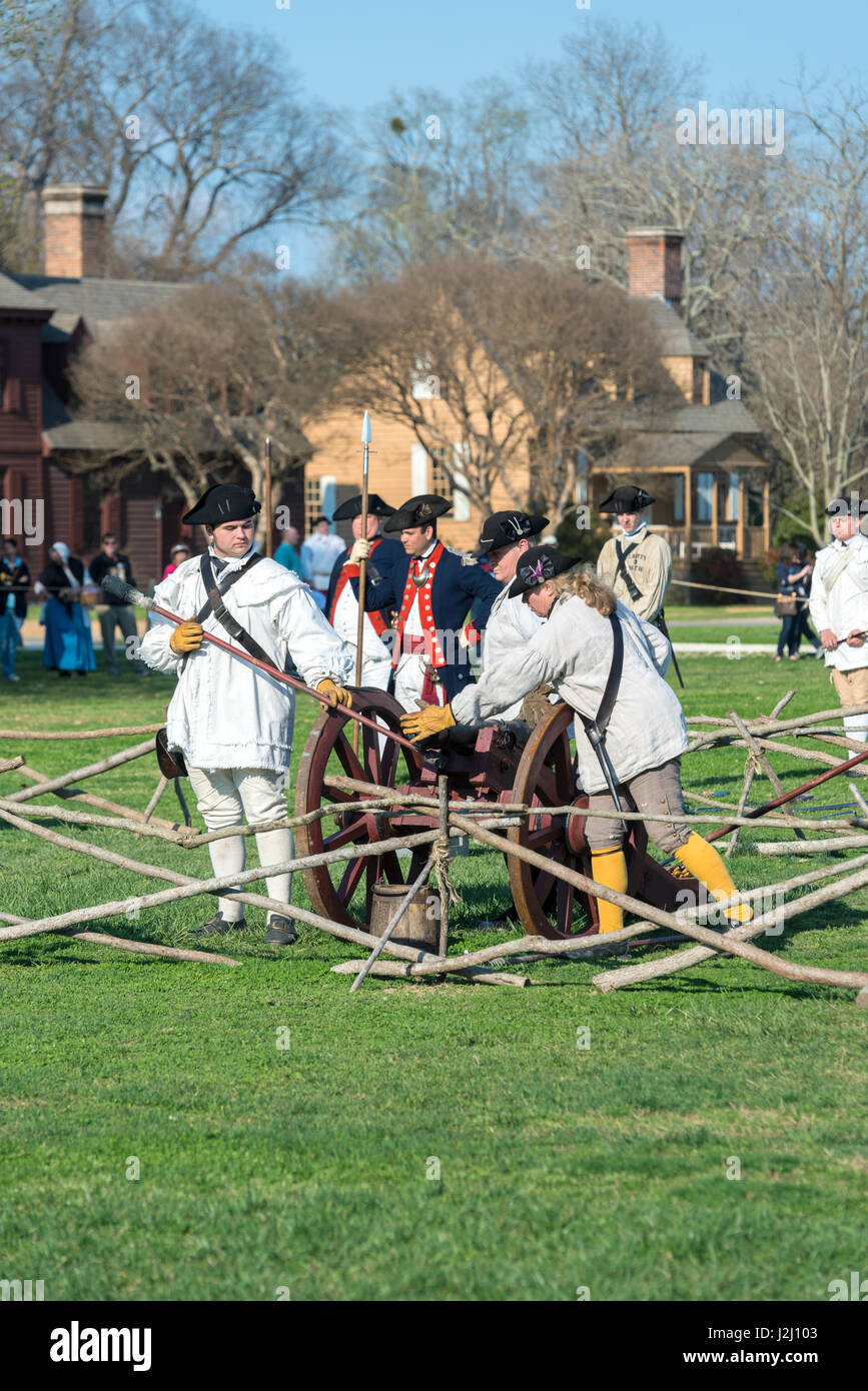 USA, Virginia, Williamsburg, Colonial Williamsburg, loading cannon ...