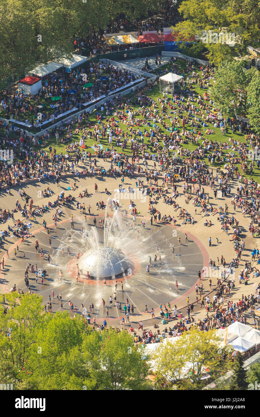 Music stages and food booths, crowds around Seattle Center Fountain ...