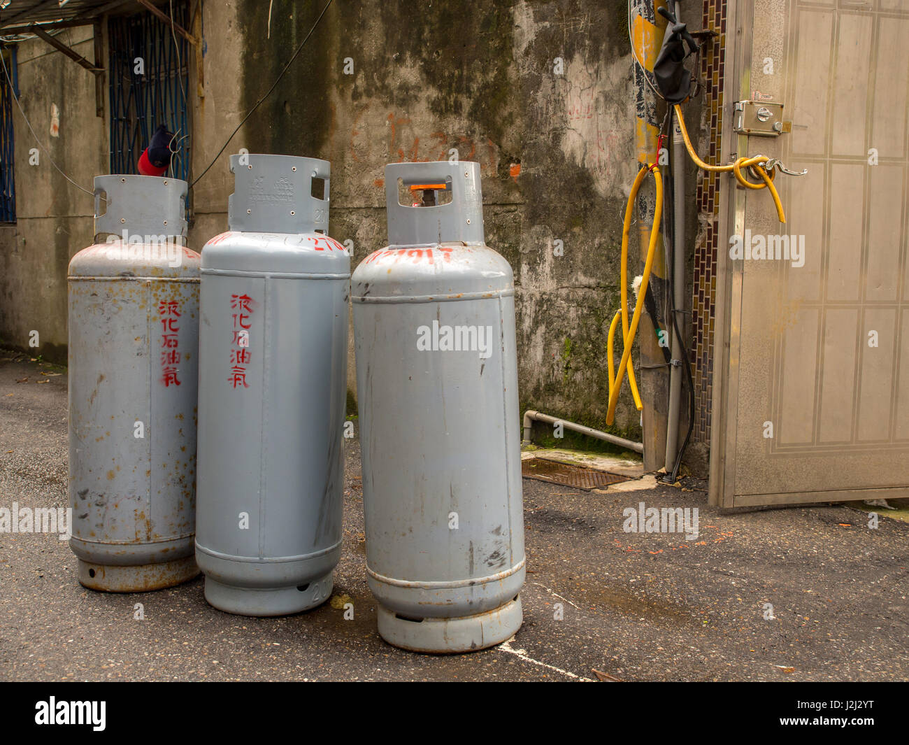 Taipei, Taiwan - October 08, 2016: Gray, metallic gas cylinders with a ...